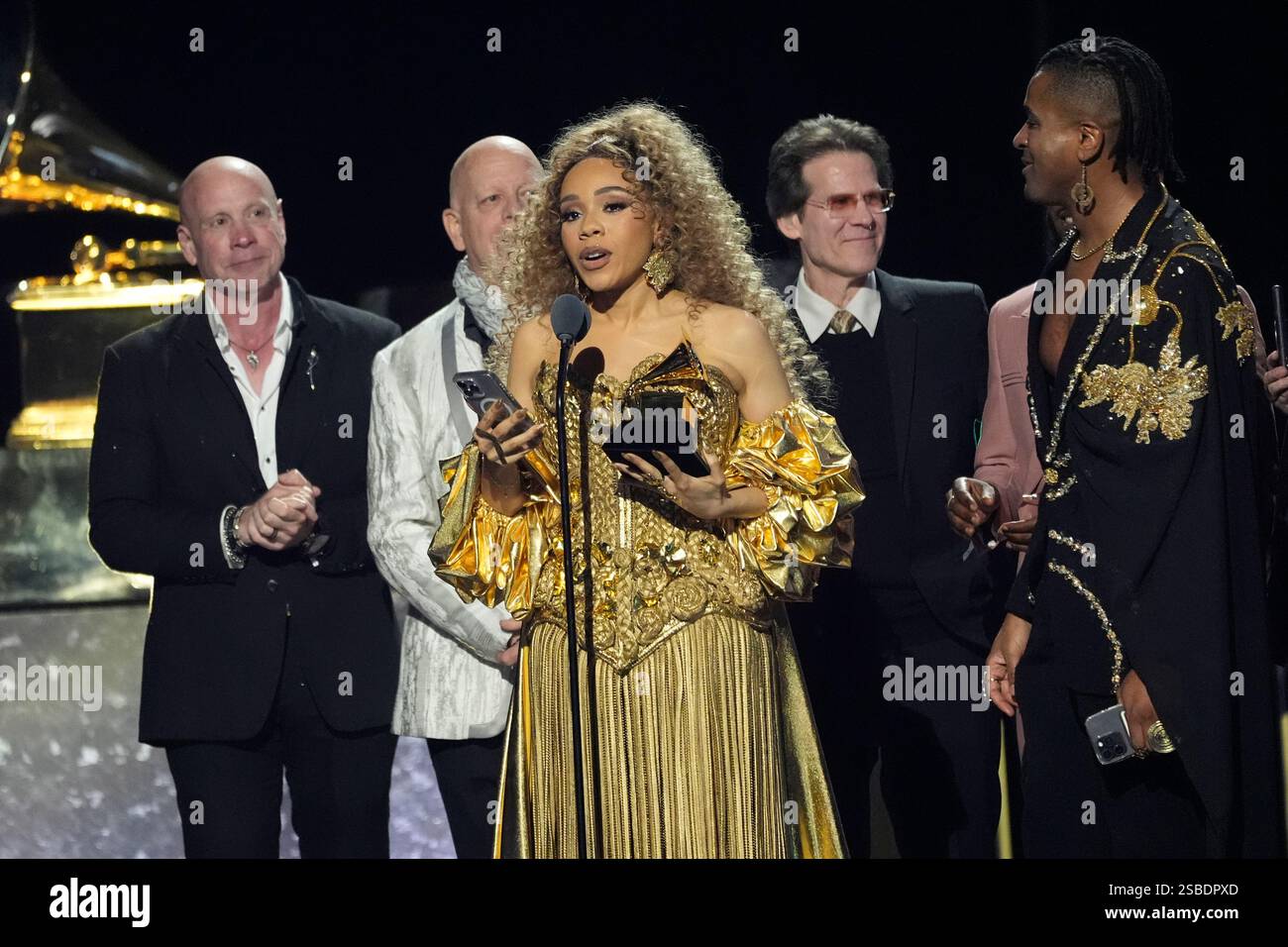 Angela Benson, left, and Matt B accept the award for best global music ...