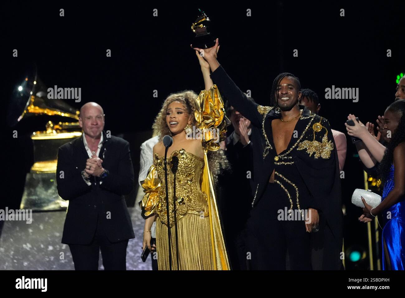 Angela Benson, left, and Matt B accept the award for best global music ...