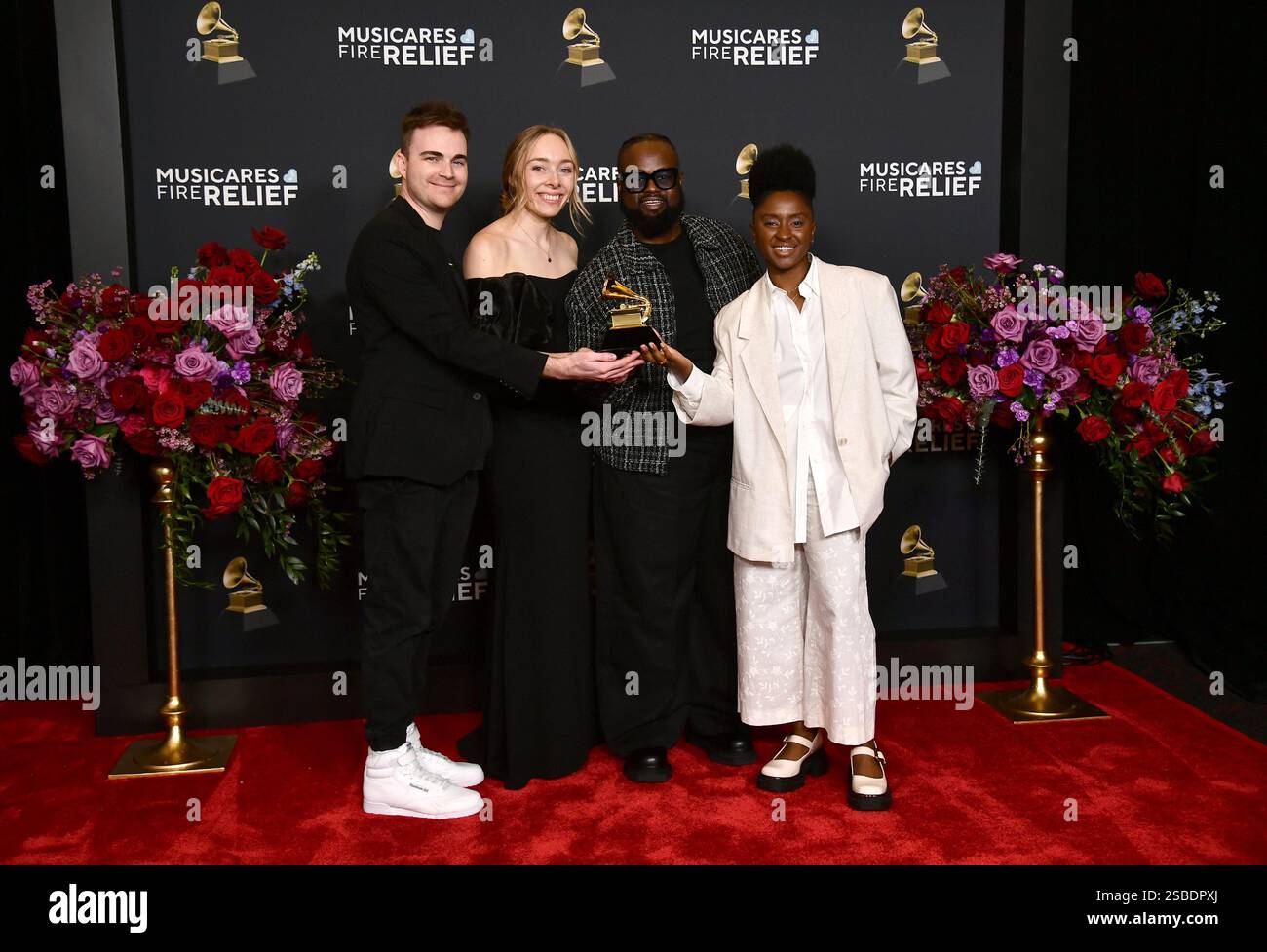 Taylor Agan, from left, Kellie Gamble, Lloyd Nicks and Jess Russ pose ...