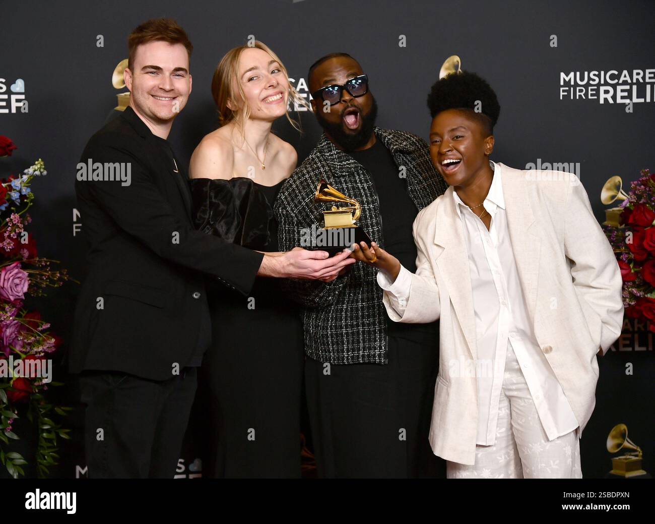 Taylor Agan, from left, Kellie Gamble, Lloyd Nicks and Jess Russ pose ...