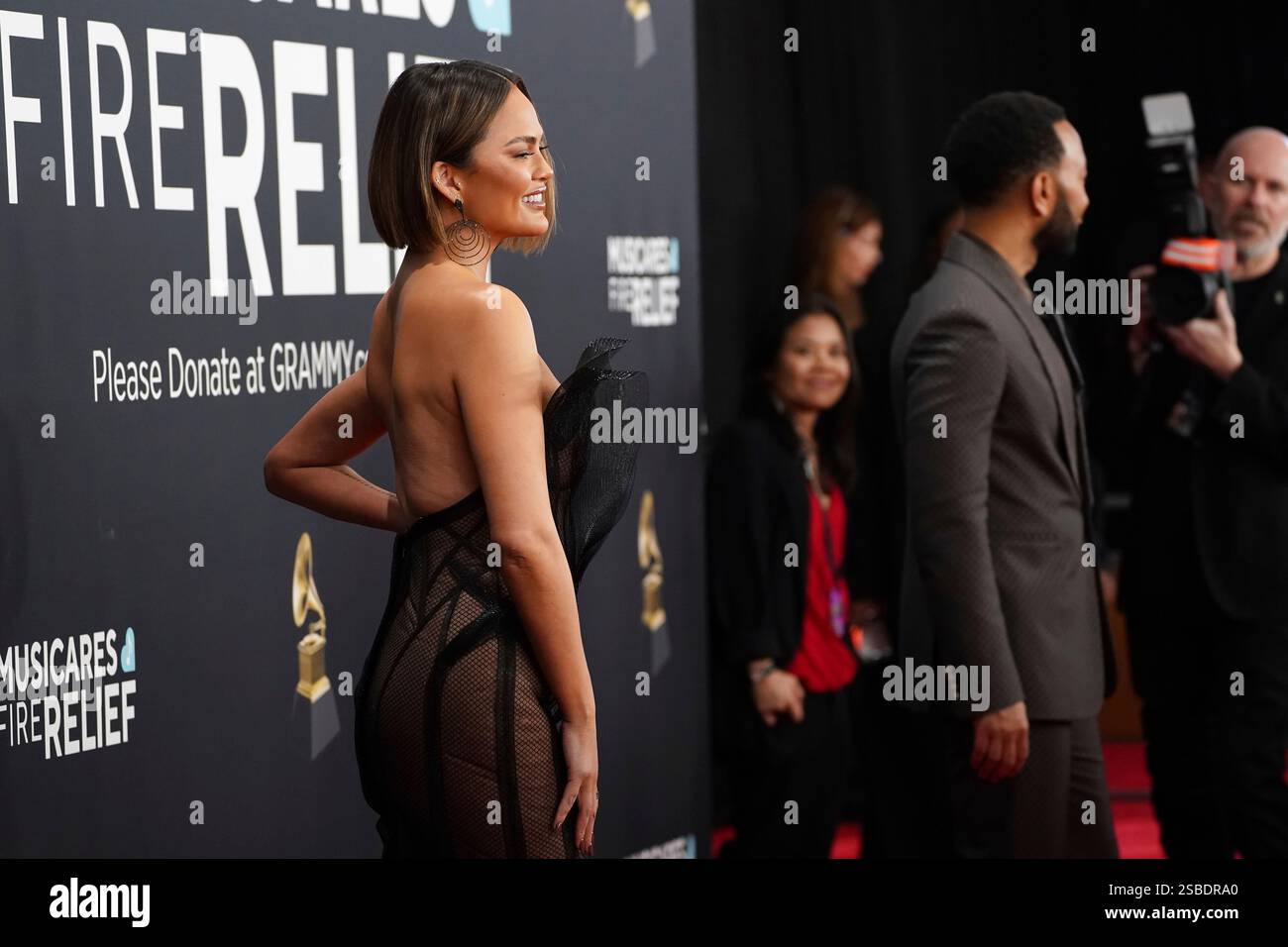 Chrissy Teigen, left, and John Legend arrive at the 67th annual Grammy ...