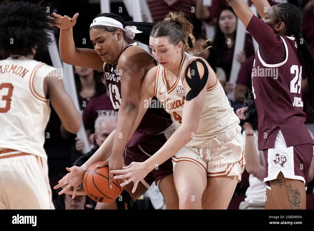 Texas A&M forward Jada Malone (13) steals the ball away from Texas ...