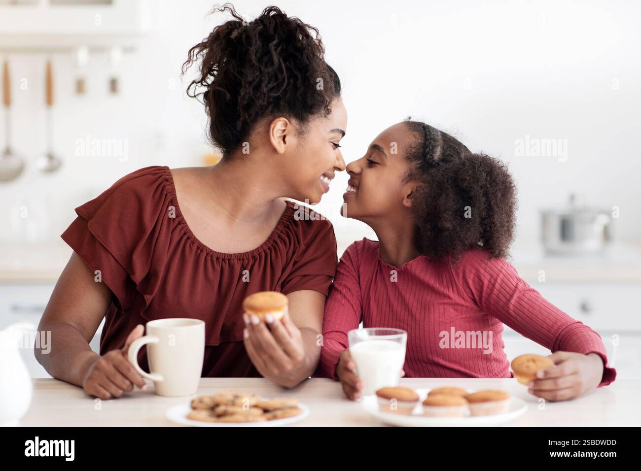 Happy african american mom and daughter enjoying time together Stock Photo - Alamy