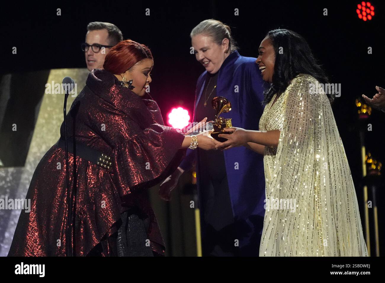 Michelle Cann, left, and Karen Slack accept the award for best ...