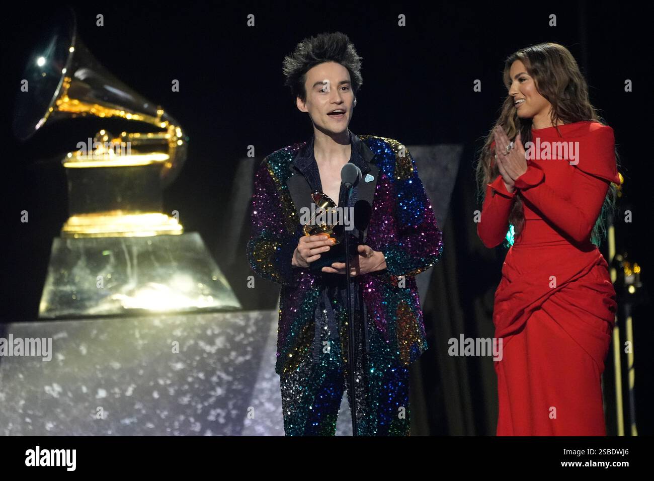 Jacob Collier, left, and Tori Kelly accept the award for best arrangement, instrumental or a ...