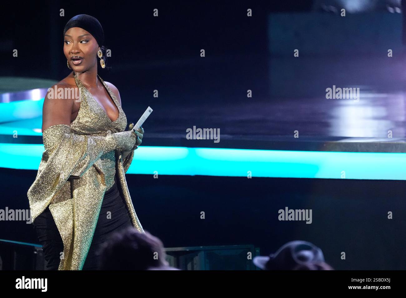 Tems goes to accept the award for best african music performance for ...