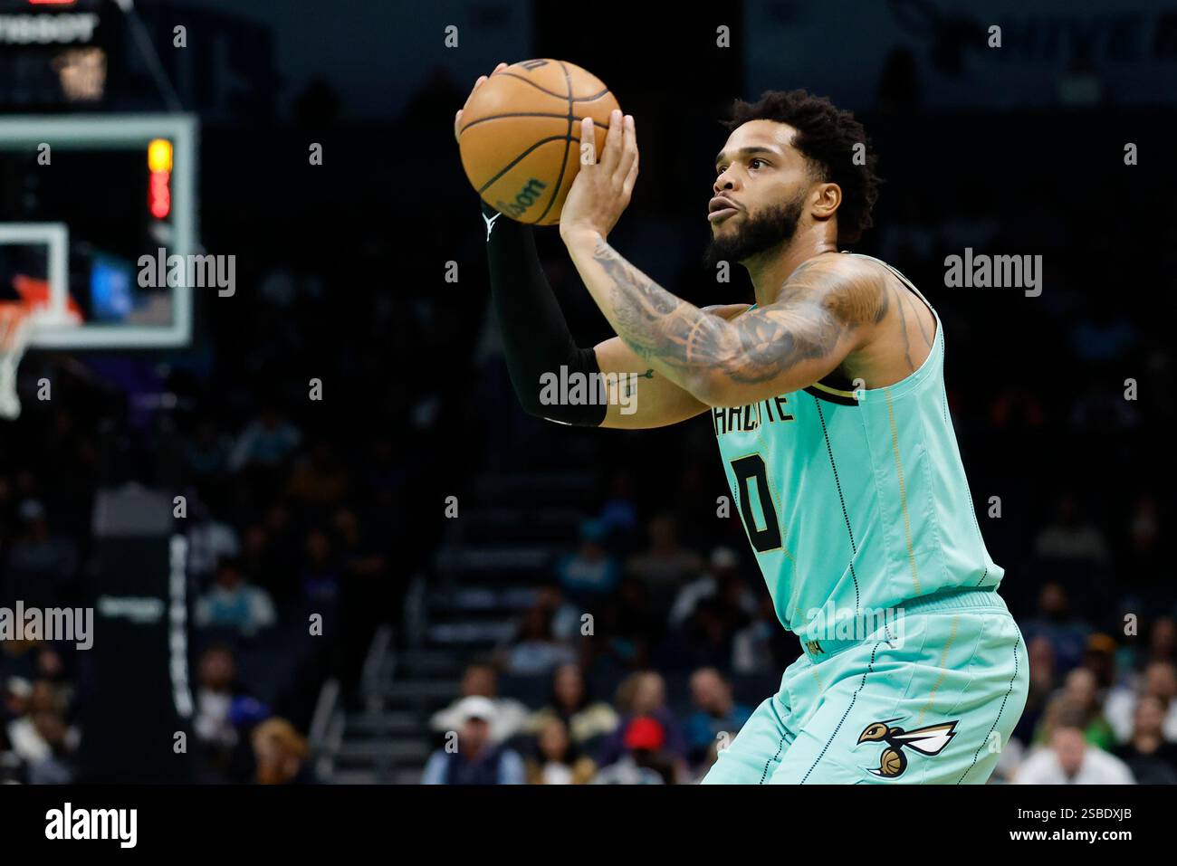 Charlotte Hornets forward Miles Bridges shoots during the first half of ...
