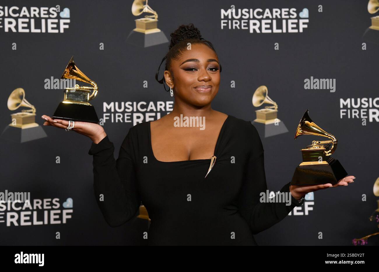 Samara Joy poses in the press room with the award for best jazz ...