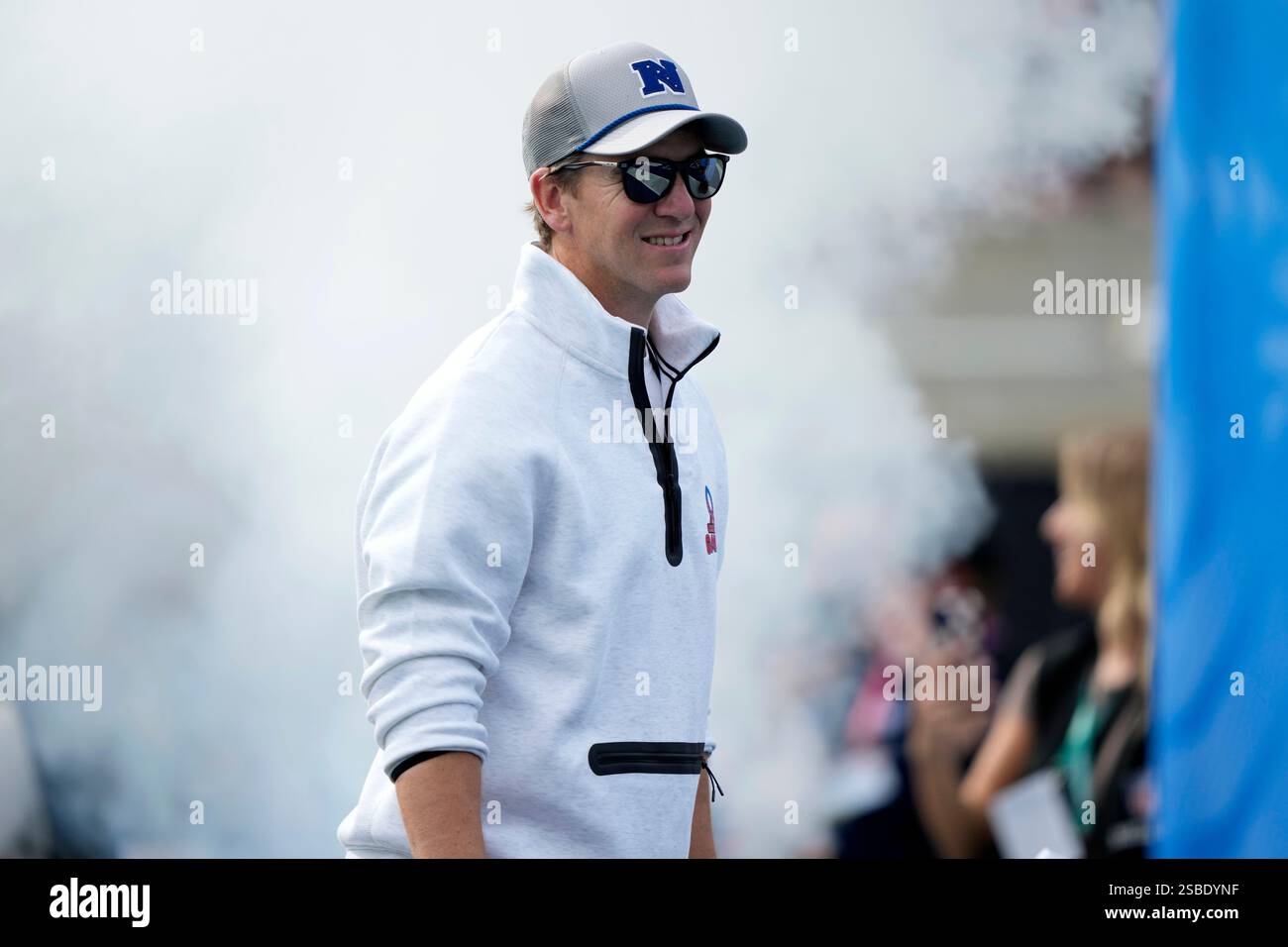 NFC head coach Eli Manning watches as players are introduced before the ...