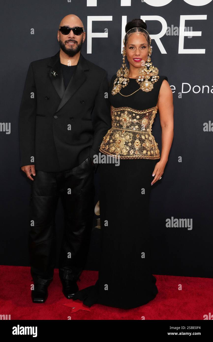 Swizz Beatz, left, and Alicia Keys arrive at the 67th annual Grammy ...