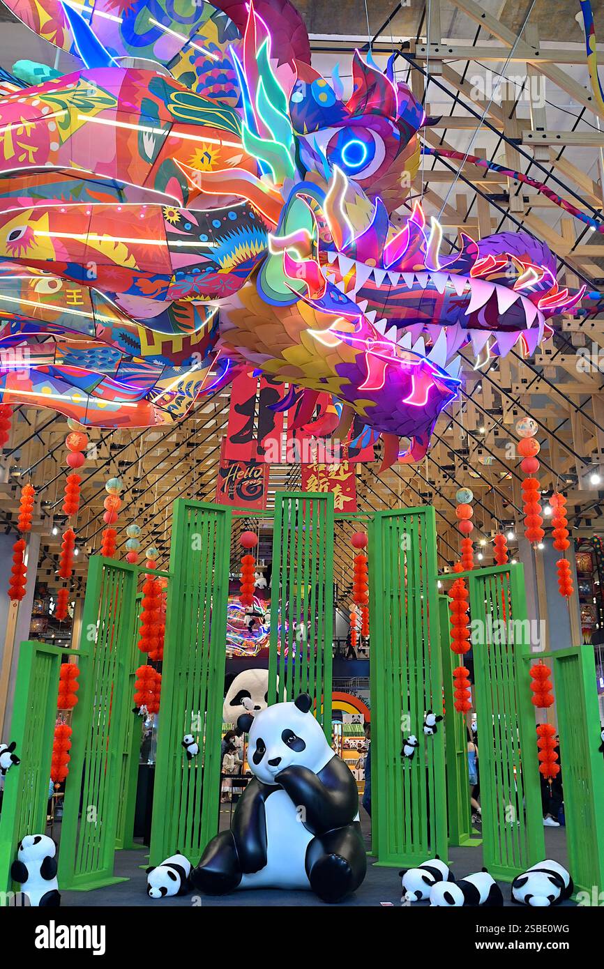 Colorful modern Dragon sculpture and pandas on display at a popular ...