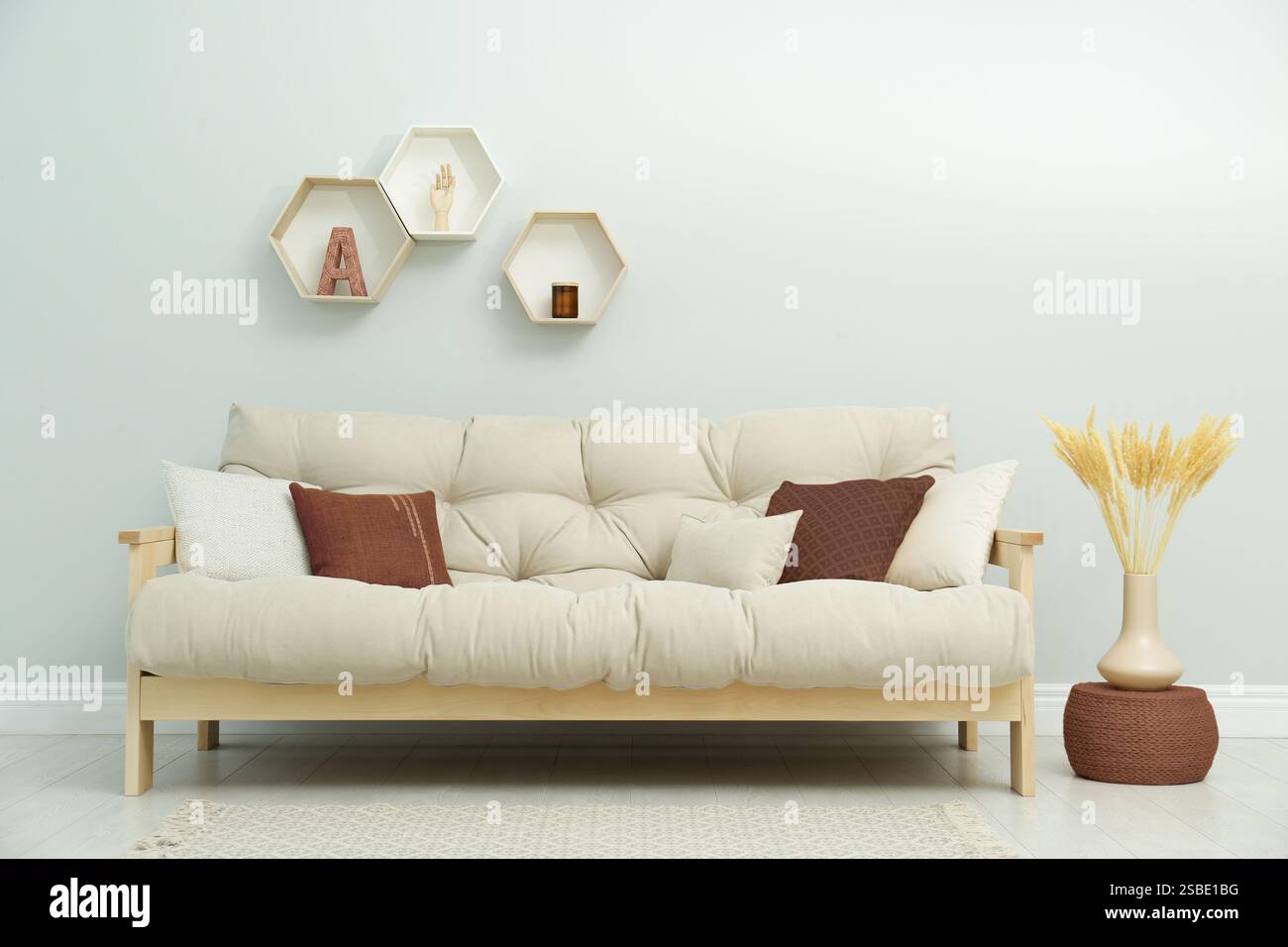 Cozy living room with decorative elements in mocha mousse shade ...
