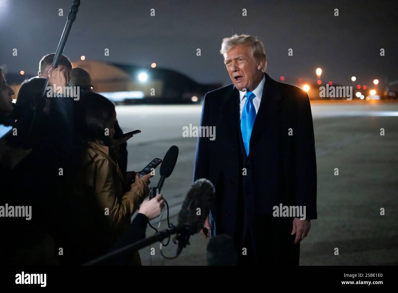 President Donald Trump speaks to reporters next to Air Force One after ...