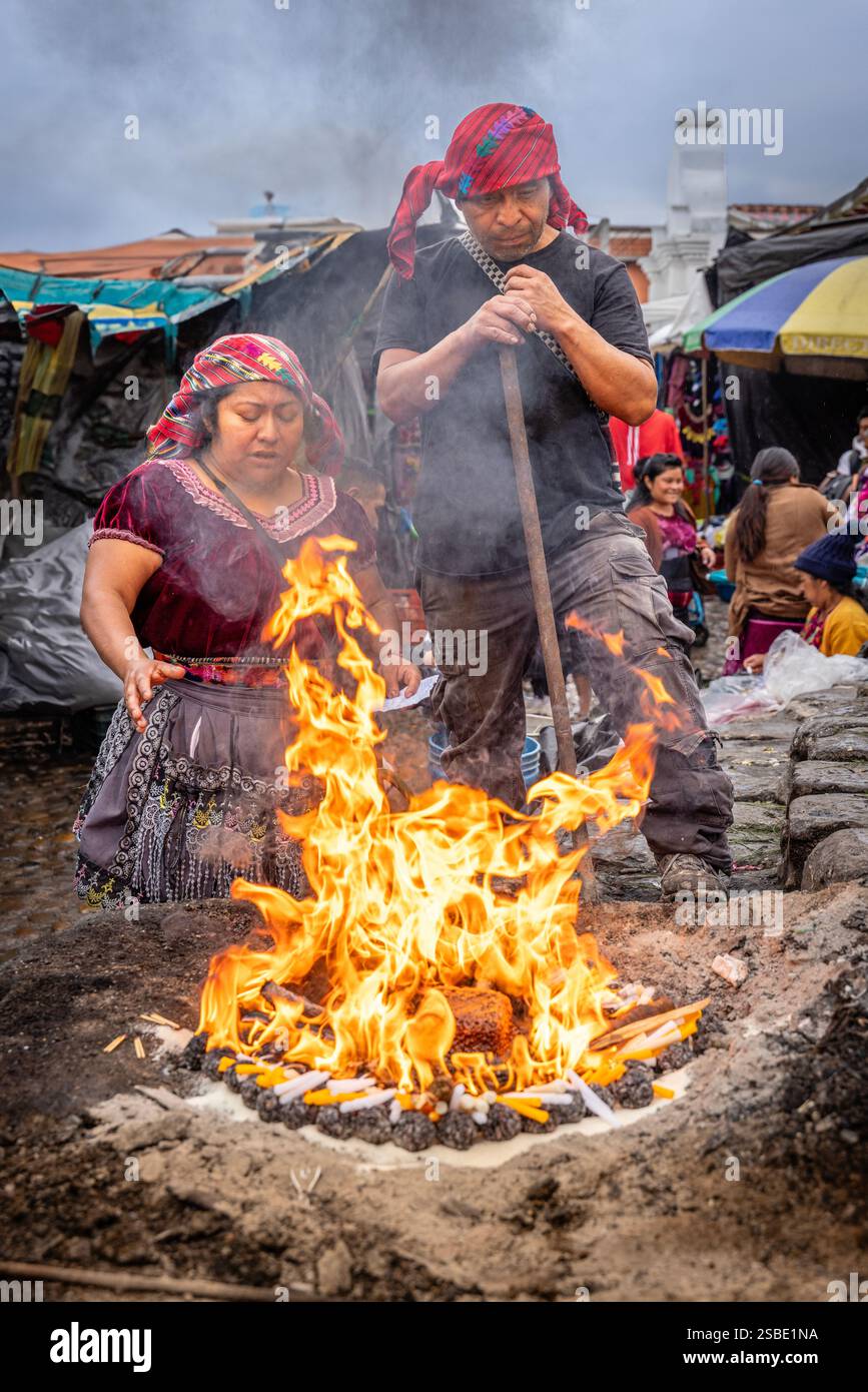 Sacred fire ritual of Quiche Mayan devotees for the Mayan gods on the ...
