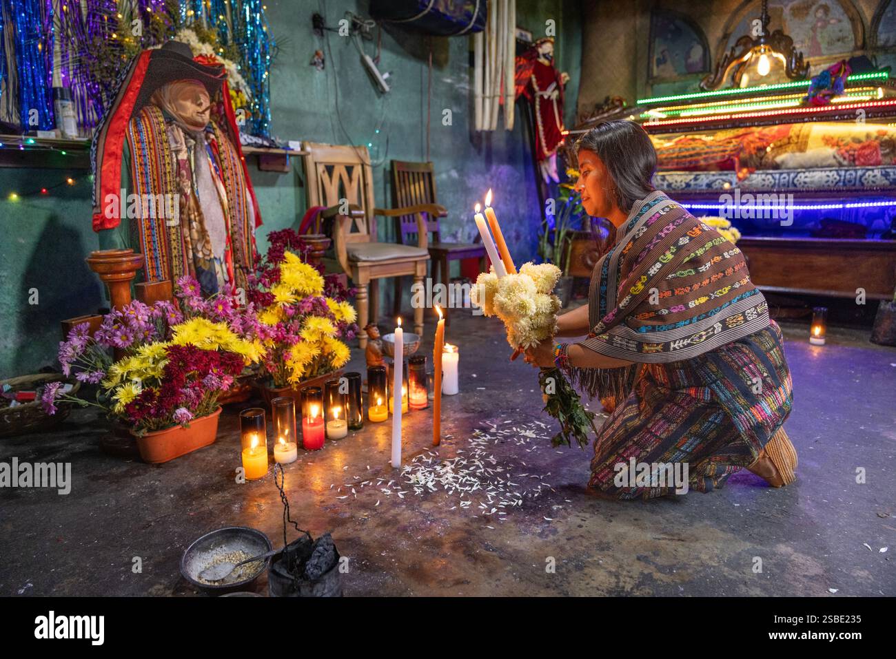 Ceremony of Maximon,the Mayan deity, at the village of Santiago Atitlan ...