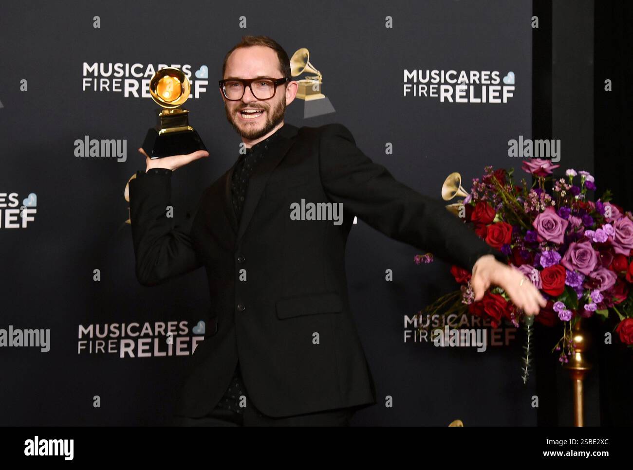 Pascal Le Boeuf poses in the press room with the award for best ...