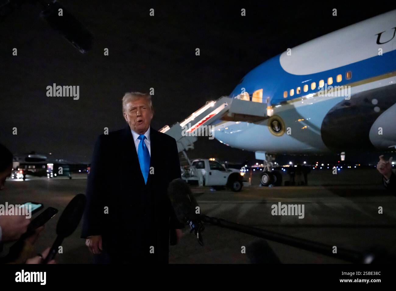 President Donald Trump speaks to reporters next to Air Force One after ...