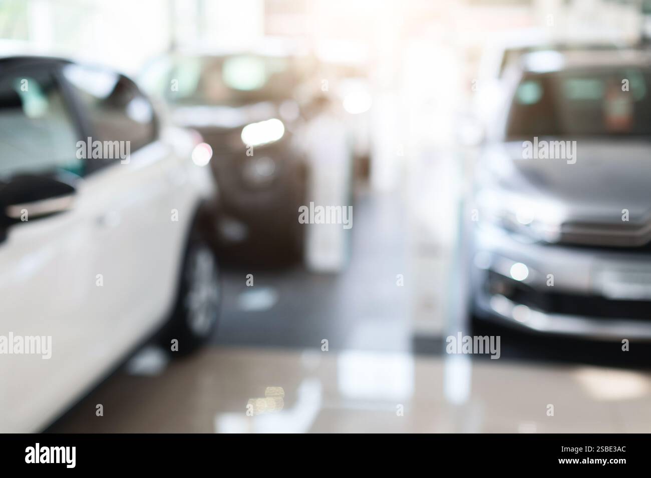 Luxury automobiles in vip showroom, blurred background Stock Photo - Alamy