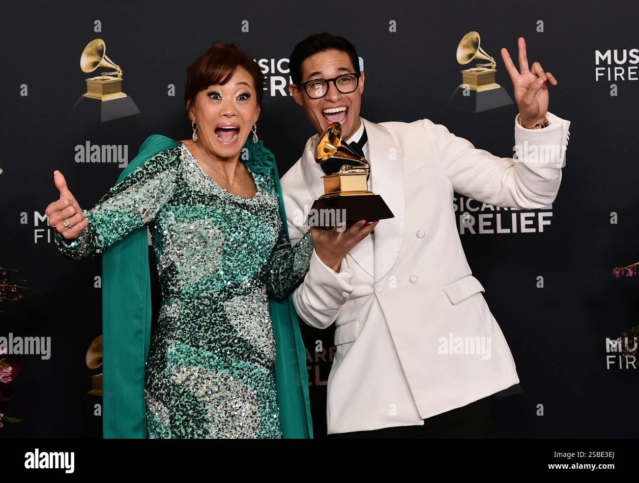 Mimy Succar, left, and Tony Succar pose in the press room with the ...
