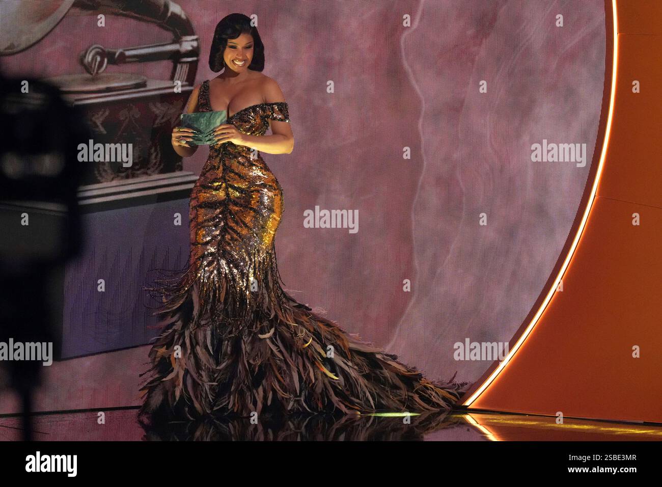 Cardi B presents the award for best rap album during the 67th annual ...