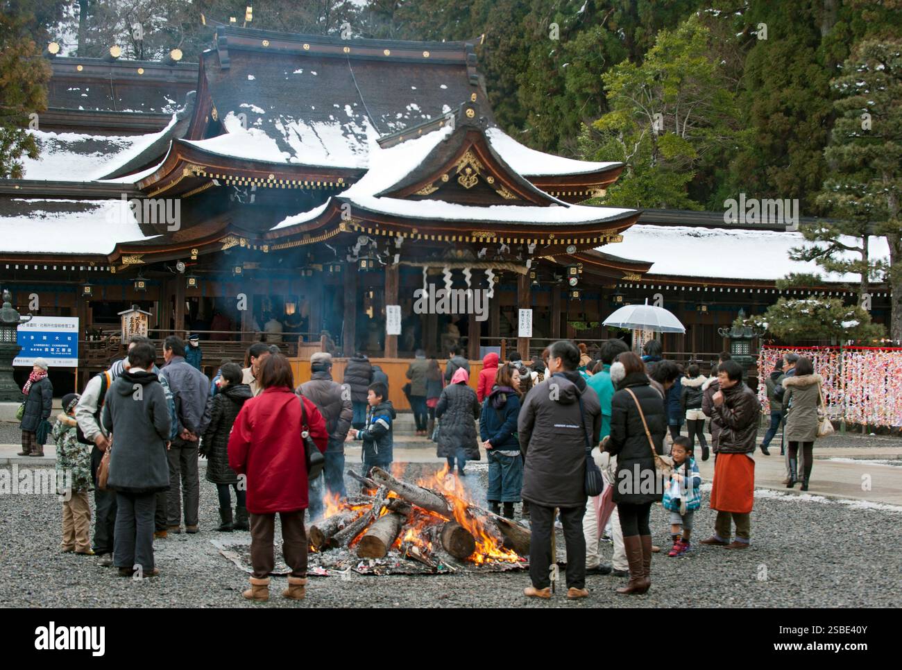 Crowds of visitors during "hatsumode" (New Year shrine visit) gather in ...
