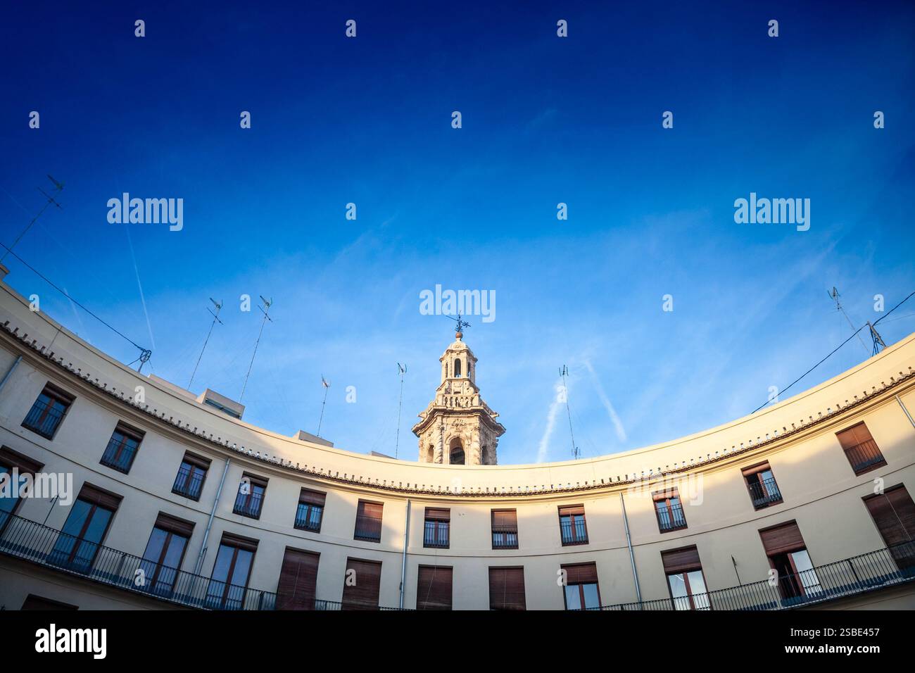 The curved facade of Plaza Redonda, known as Placa Redona in Valencian ...