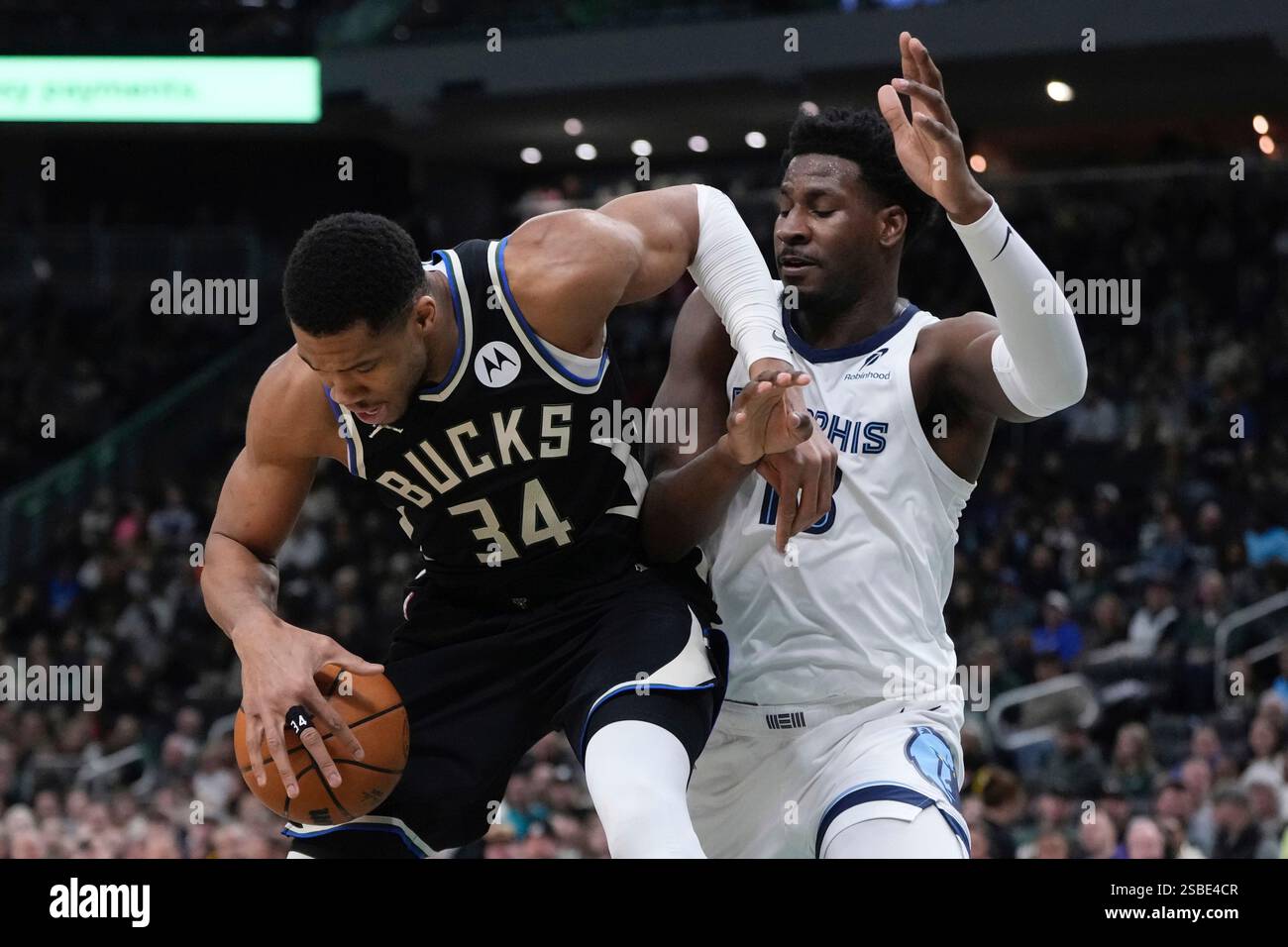 Milwaukee Bucks' Giannis Antetokounmpo tries to get past Memphis ...