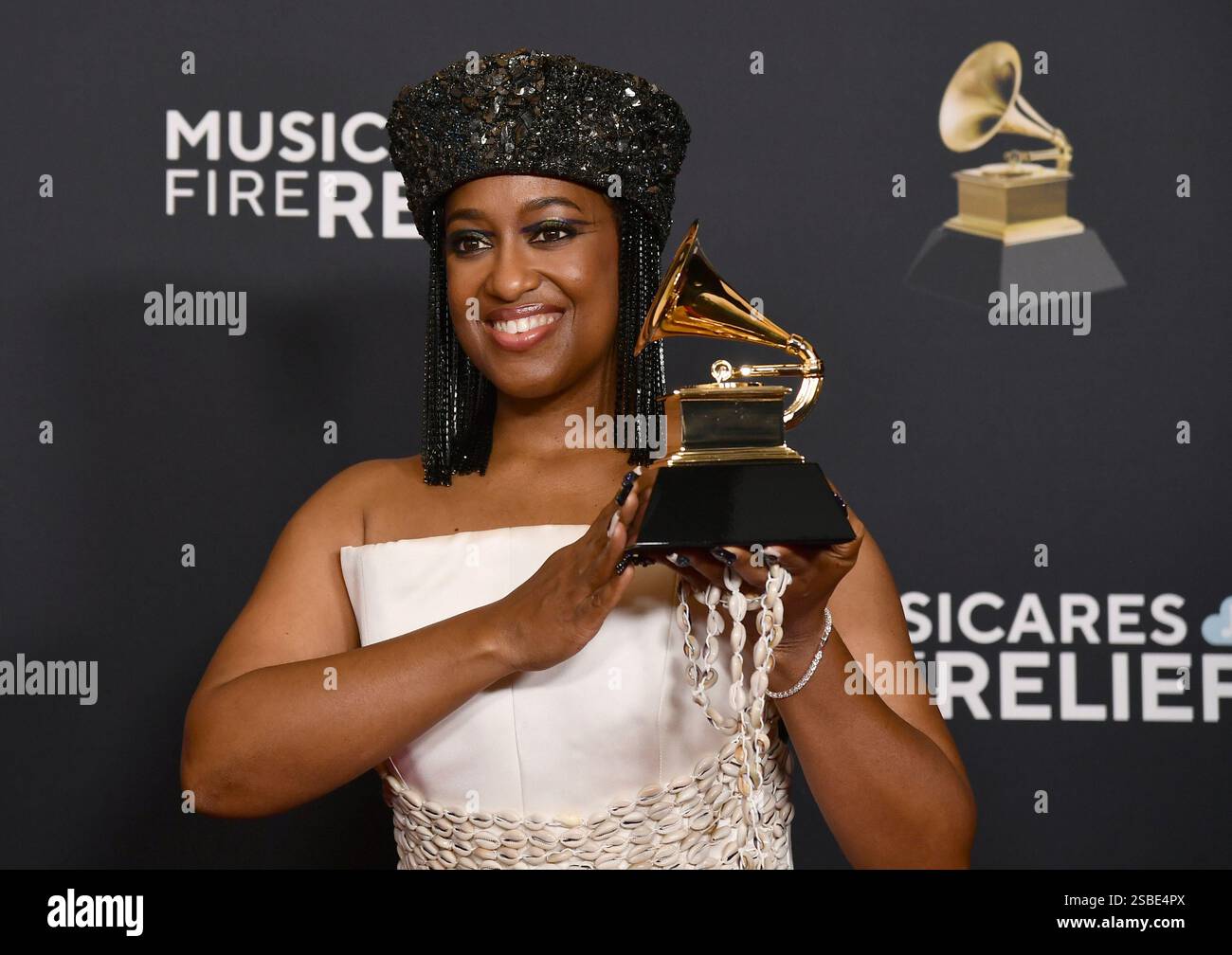 Rapsody poses in the press room with the award for best melodic rap ...