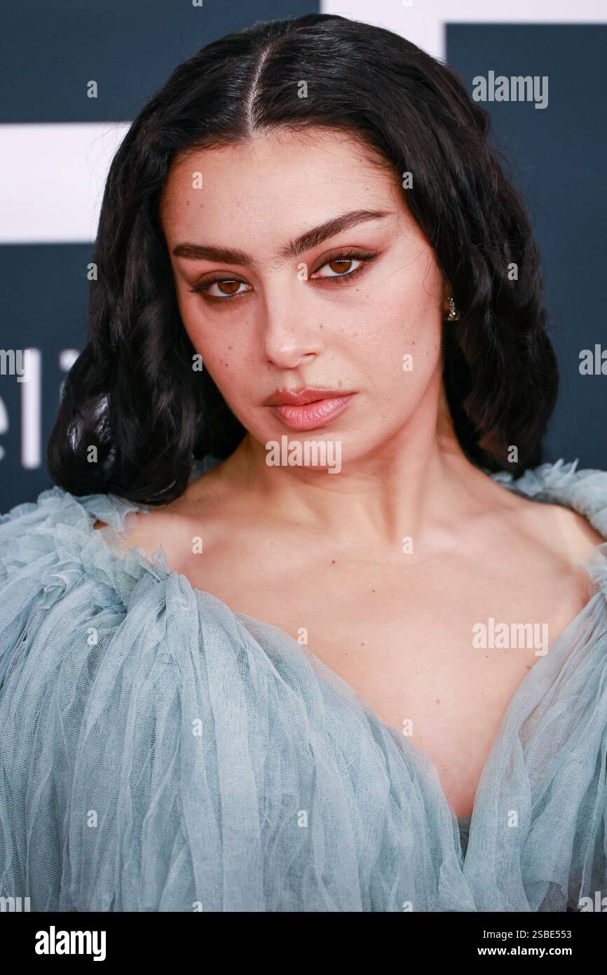 Charli XCX walking on the red carpet during the 67th Grammy Awards held ...
