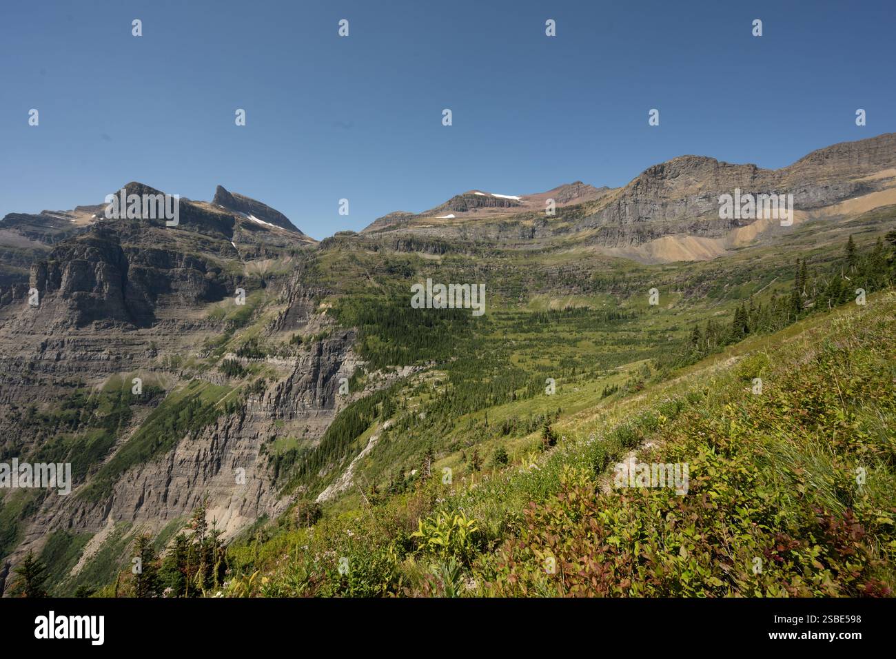 Boulder Pass Sits High On The Ridge Over Hole In The Wall in Glacier ...