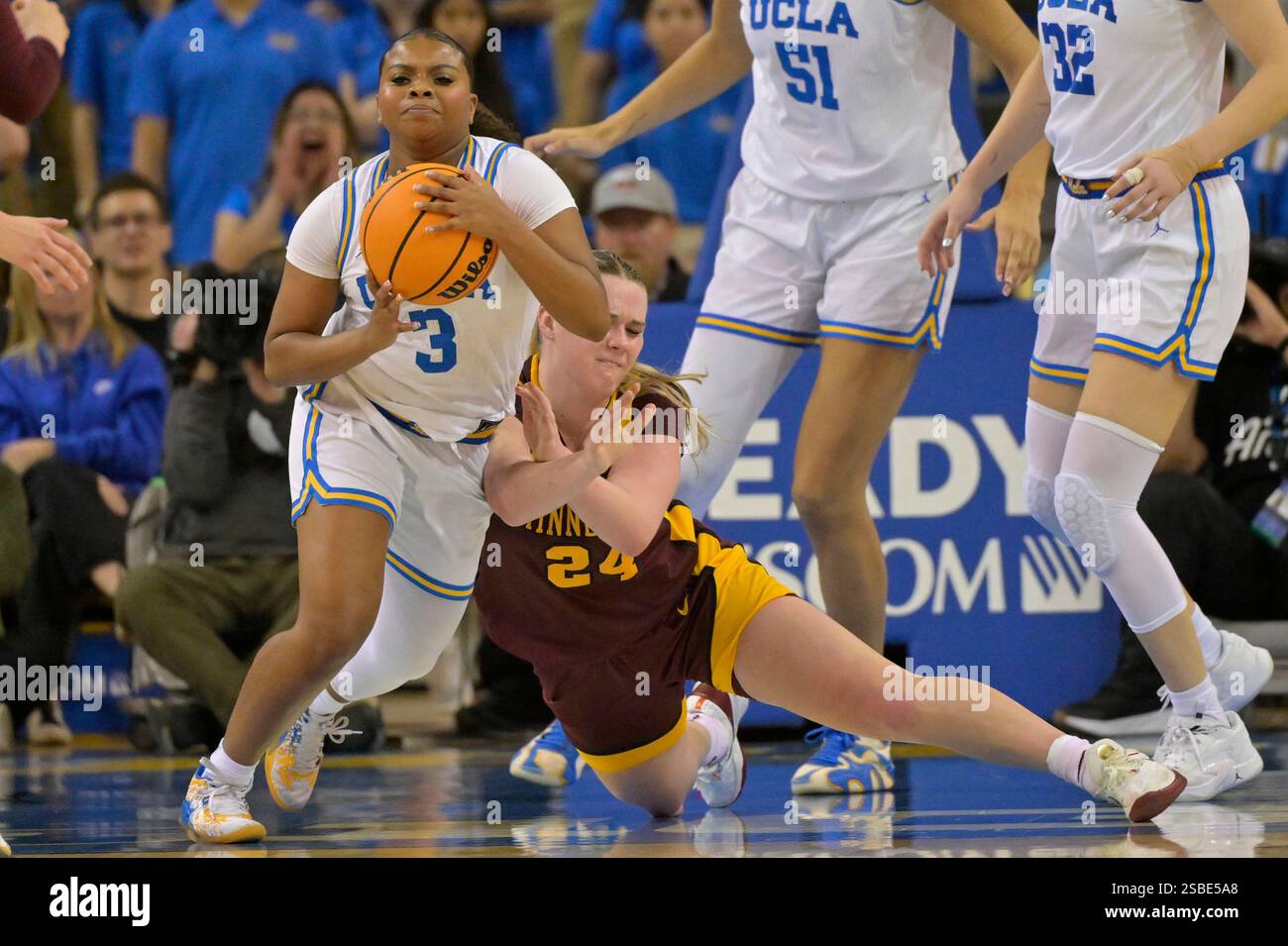 UCLA guard Londynn Jones, left, steals the all from Minnesota forward ...