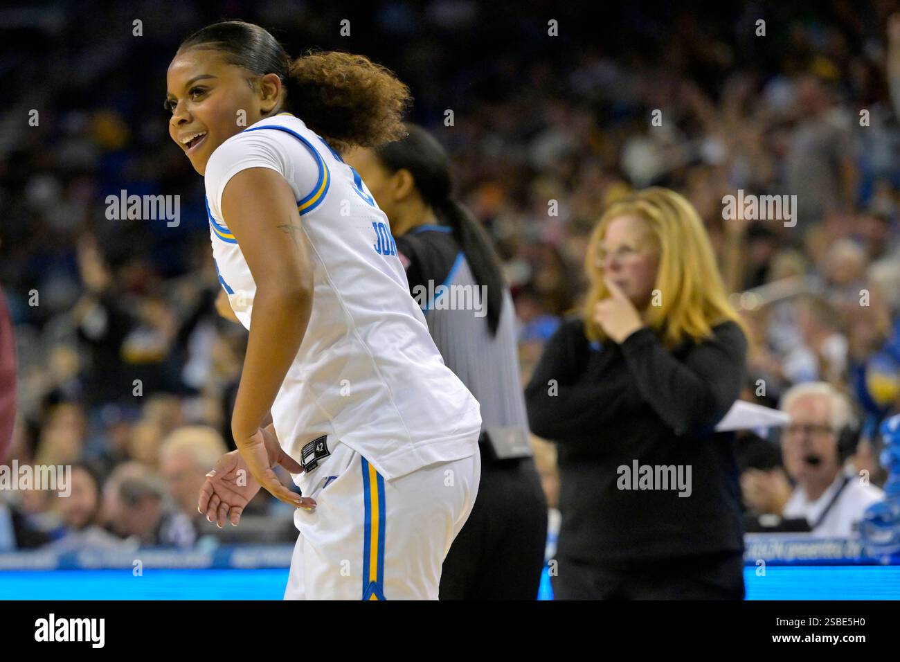 UCLA guard Londynn Jones reacts after a 3-point basket during the ...