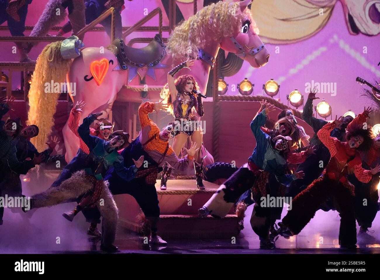 Chappell Roan, center, performs "Pink Pony Club" during the 67th annual ...