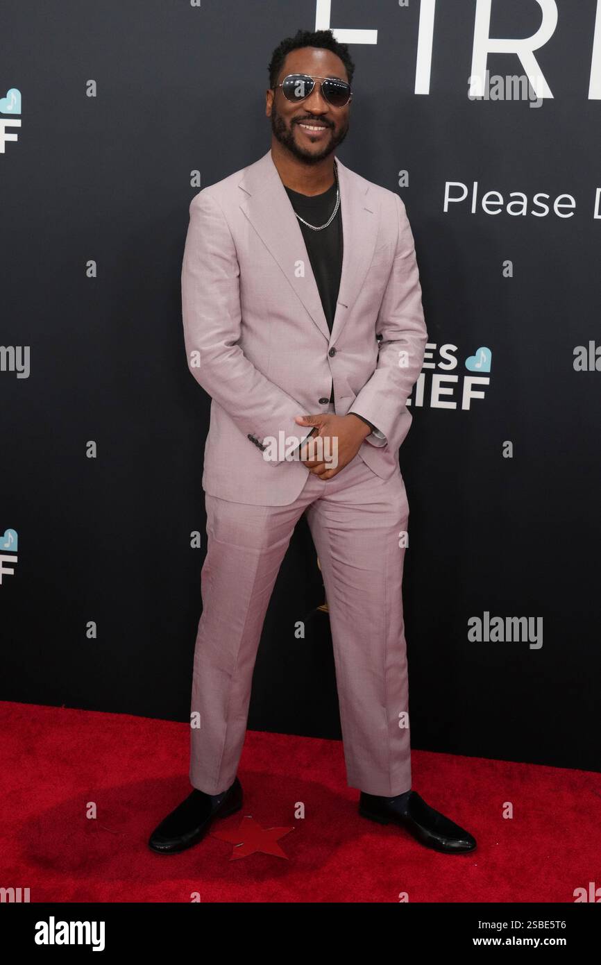 Kevin Theodore arrives at the 67th annual Grammy Awards on Sunday, Feb ...
