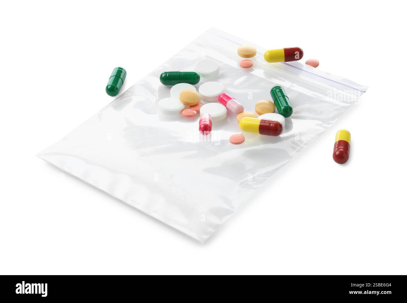 Drug addiction. Different pills and plastic bag with powder isolated on ...