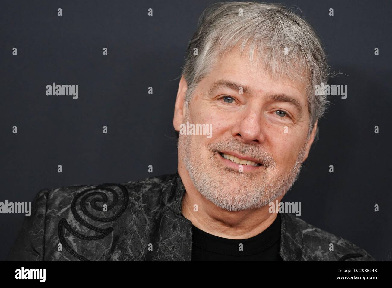 Bela Fleck arrives at the 67th annual Grammy Awards on Sunday, Feb. 2 ...