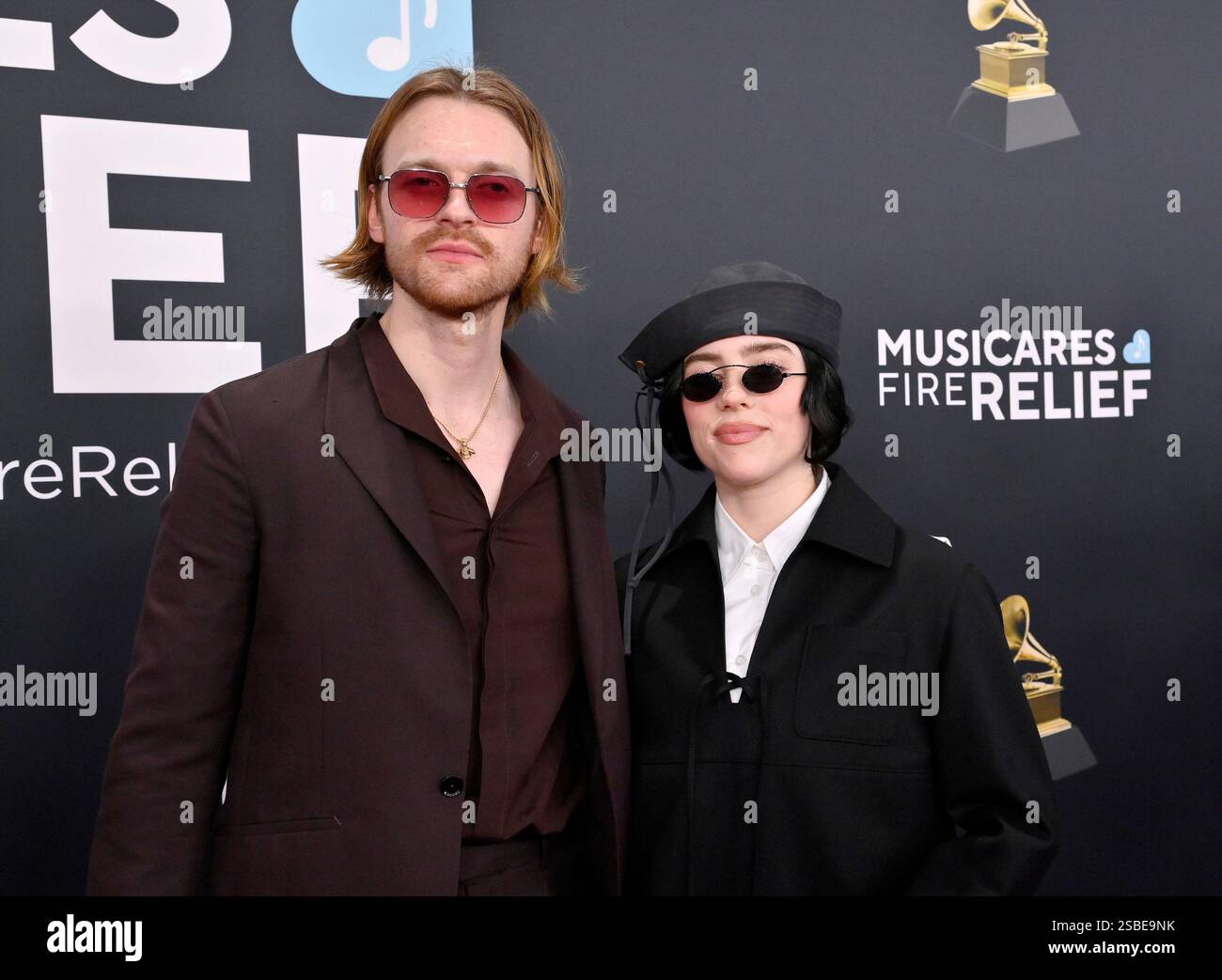 (L-R) FINNEAS and Billie Eilish arrive for the 67th Annual Grammy Awards at Crypto.com Arena in ...