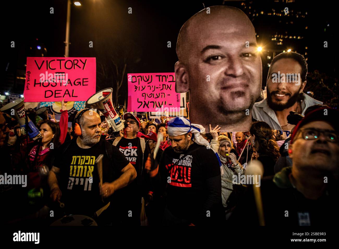 Tel Aviv, Israel. 01st Feb, 2025. Demonstrators hold large cutouts of ...