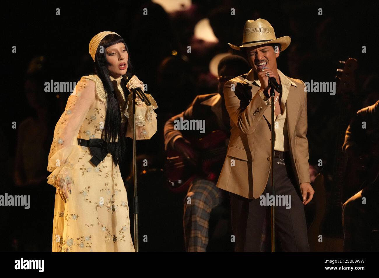 Lady Gaga, left, and Bruno Mars perform "California Dreamin'" during the 67th annual Grammy ...
