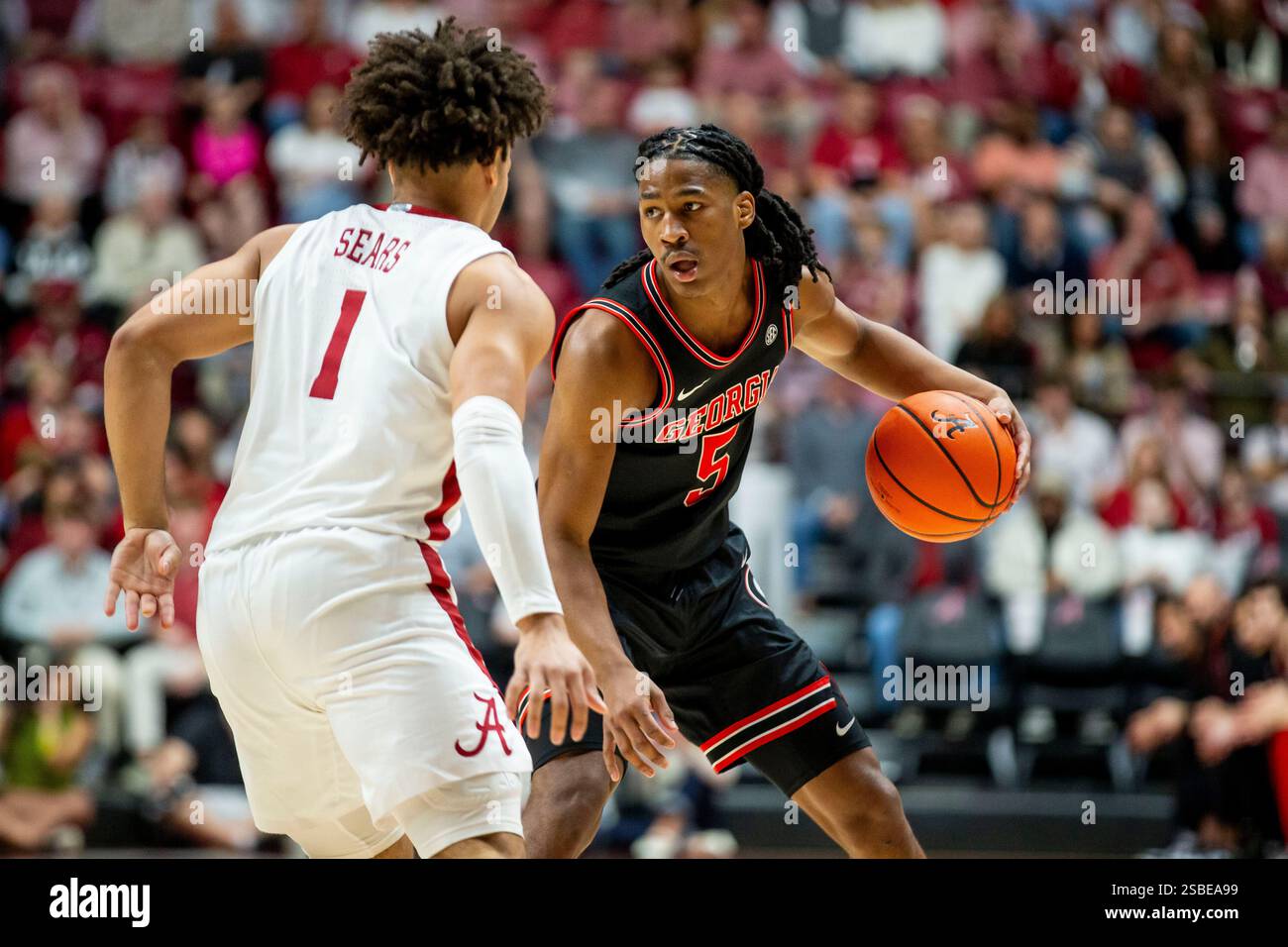 Georgia guard Silas Demary Jr. (5) works against Alabama guard Mark ...
