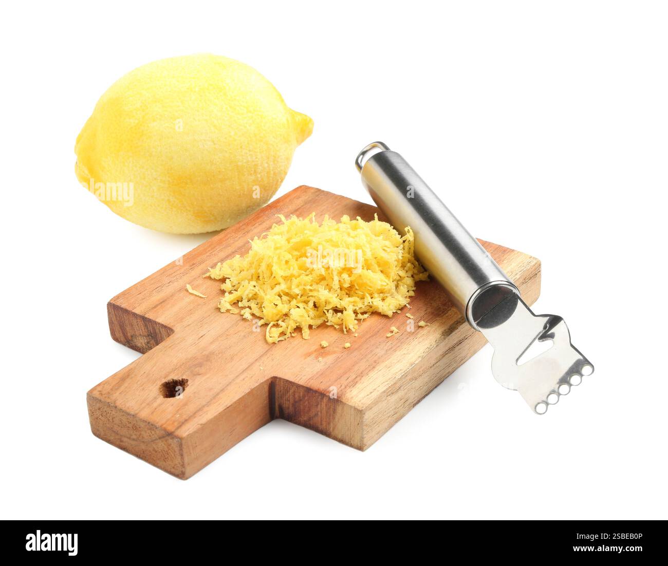 Lemon zest, fresh fruit and zester tool isolated on white Stock Photo ...