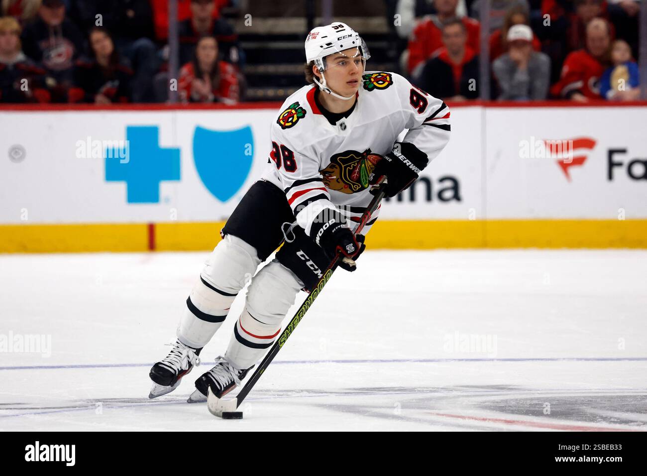 Chicago Blackhawks' Connor Bedard (98) controls the puck against the ...