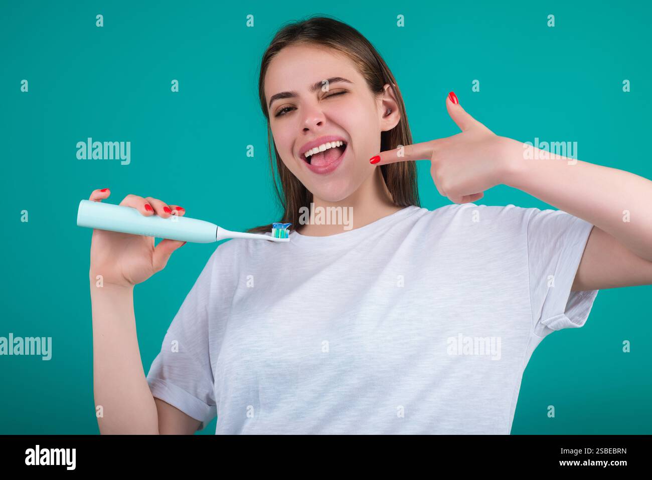 Brushing teeth. Woman holding toothbrush for tooth brushing. Dentistry ...