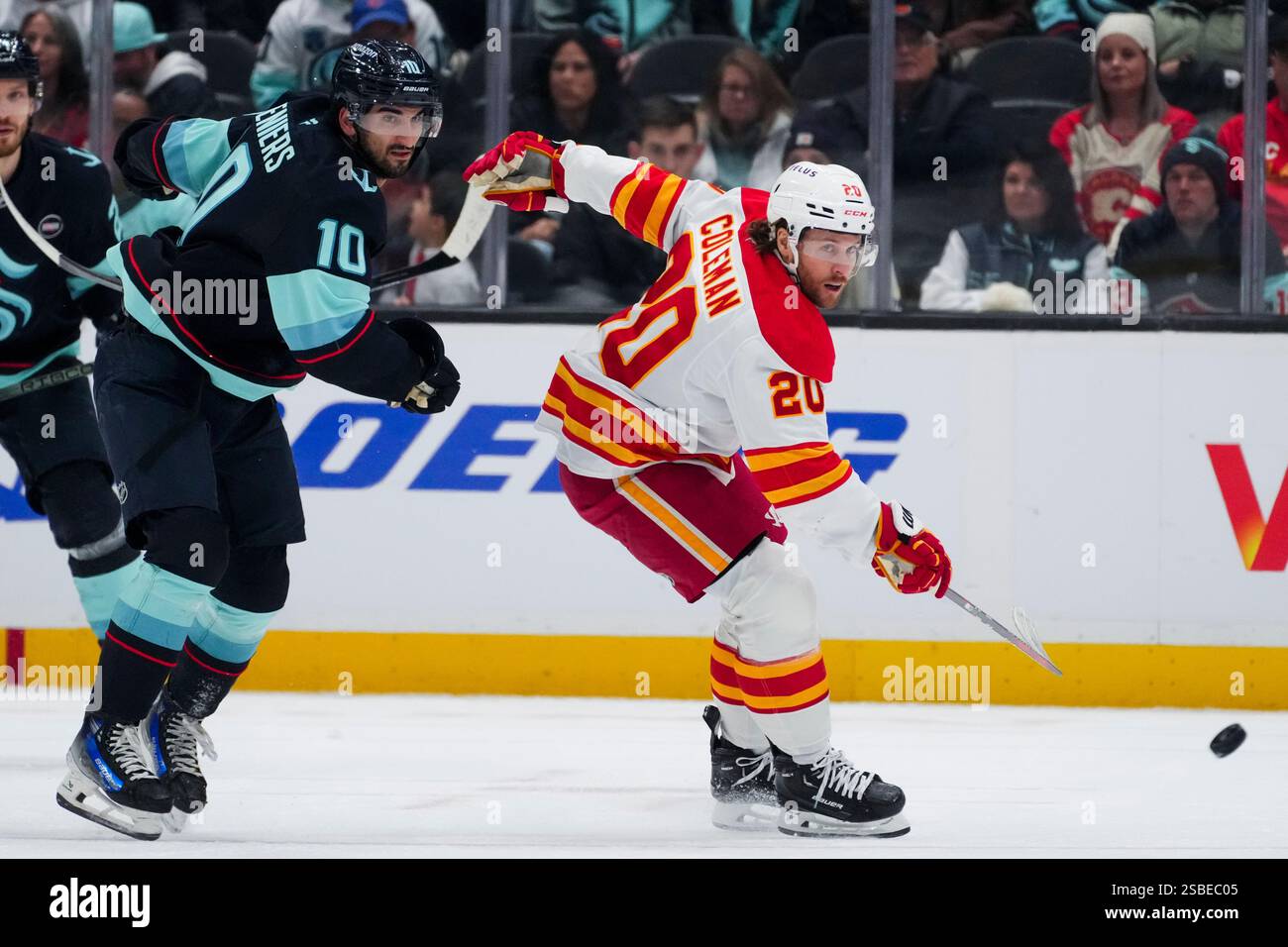 Seattle Kraken center Matty Beniers (10) looks on as Calgary Flames ...