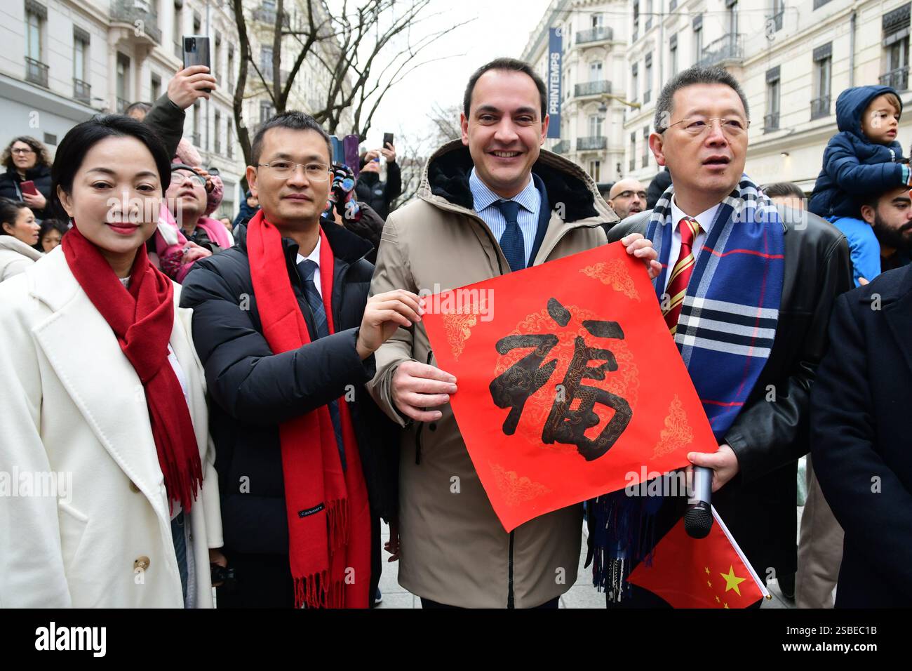 Mr. YU Jiang, Consul General of China poses for a photo with the flag during the Chinese dance ...