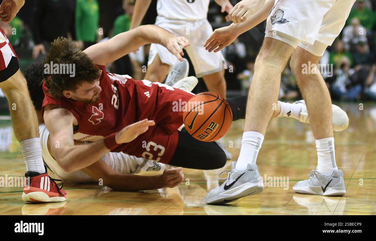 Nebraska forward Andrew Morgan (23) falls down in front of Oregon ...