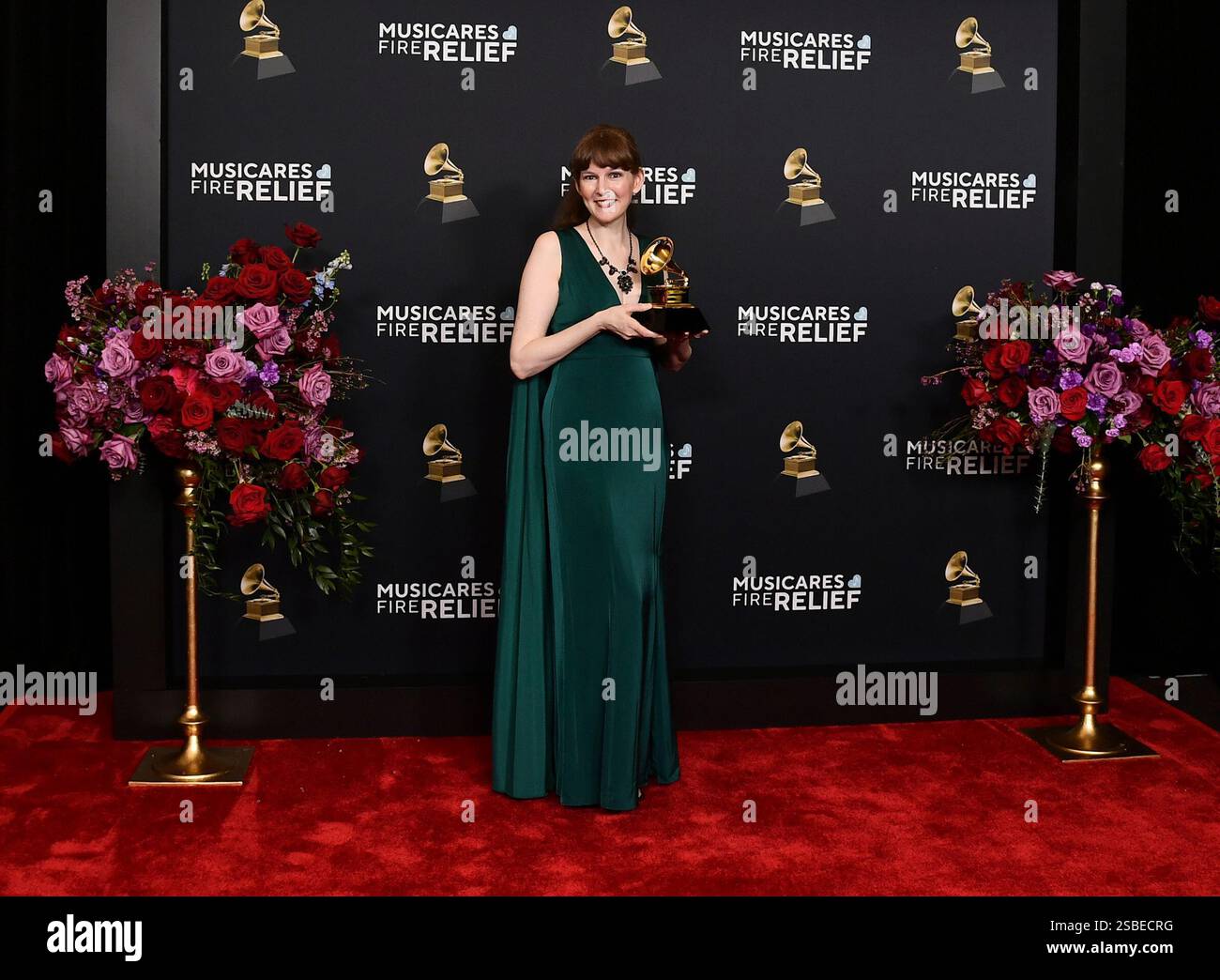 Winifred Phillips, poses in the press room with the award for best ...