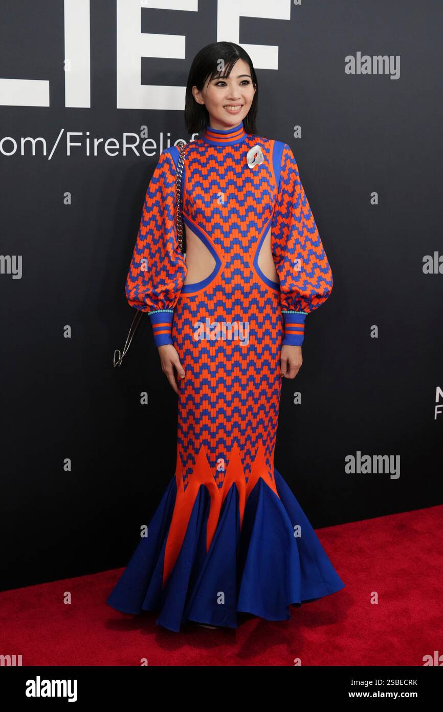 Lee Pei-Tzu arrives at the 67th annual Grammy Awards on Sunday, Feb. 2 ...