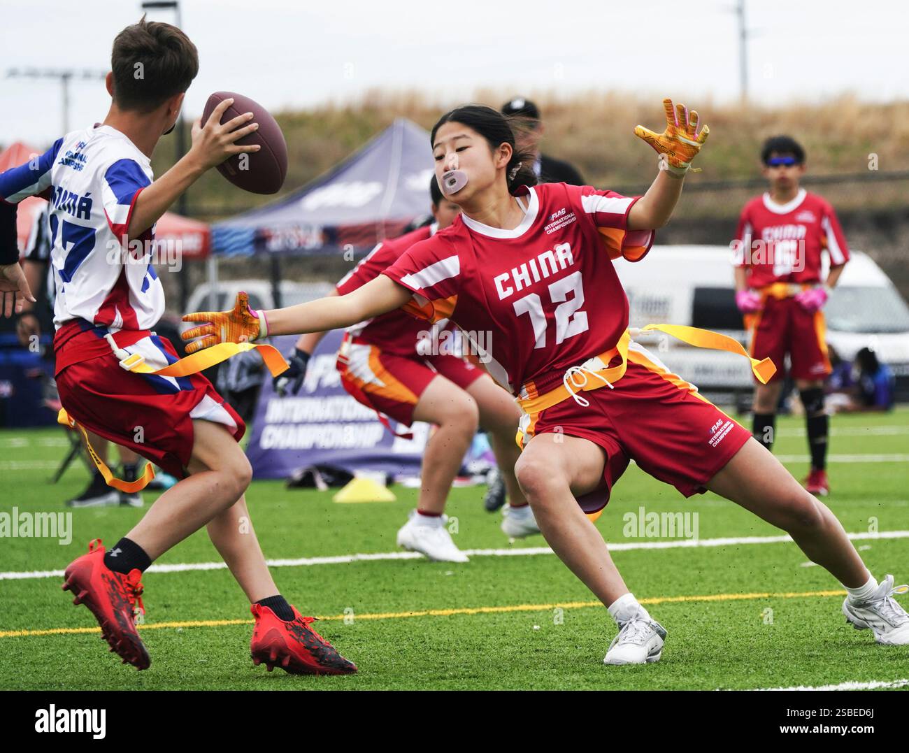 Beijing, USA. 1st Feb, 2025. Wang Ziye (front R) of China competes ...