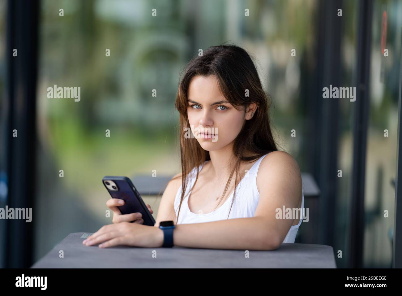 Teen girl checking messages. Teenager talking on phone. Girl using ...